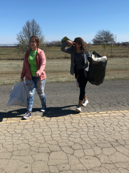 Hilldale Public Schools - 8th Graders Help Clean School Grounds